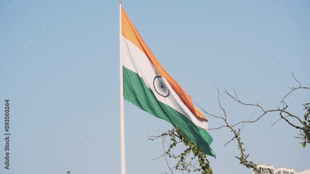 India flag flying high at Connaught Place with pride in blue sky, India ...