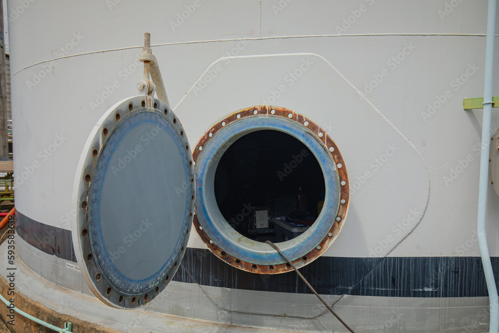 Manhole open lid steel tank chemical methanol testing at front manhole ...