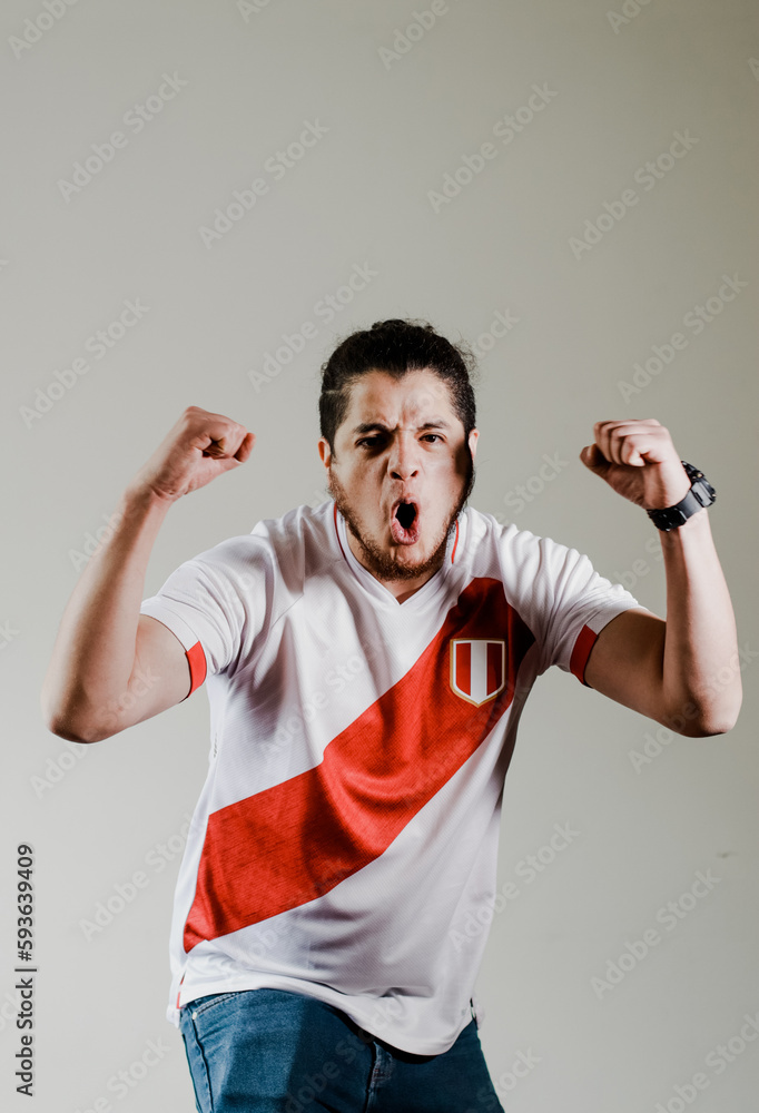 Photograph of Peruvian fan celebrating a goal of his team. Concept of ...