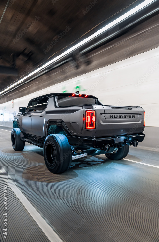 Seattle, WA, USA April 17, 2023 Hummer EV in black driving Stock Photo ...