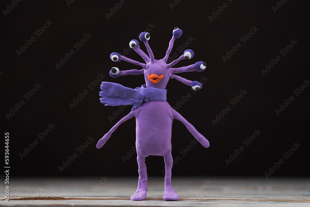 Monster with many crazy eyes, fabulous creature made by hand from ...