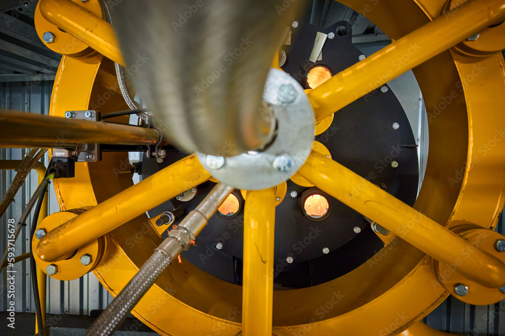 Energy technology: yellow painted industrial gas burner and its ...