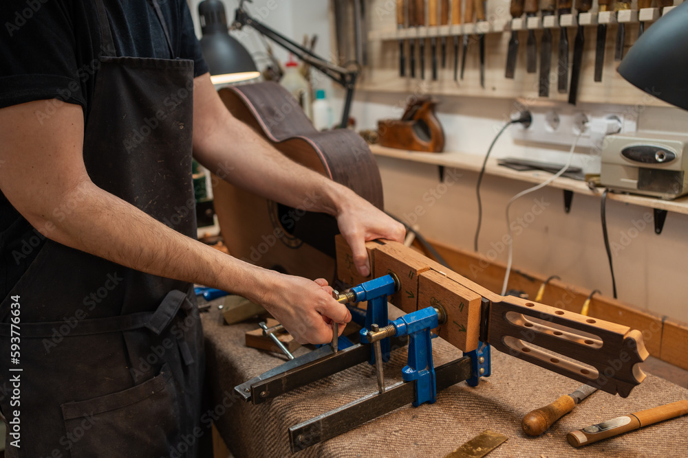 Luthier, Guitar Maker, Working In The Workshop. Stock Photo | Adobe Stock