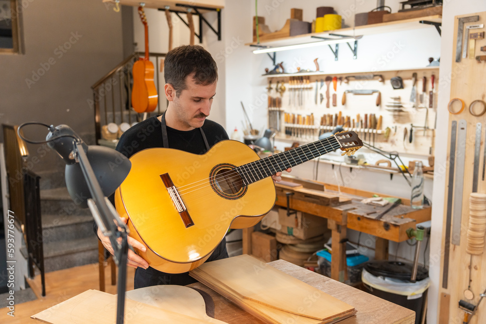 Luthier, Guitar Maker, Working In The Workshop. Stock Photo | Adobe Stock