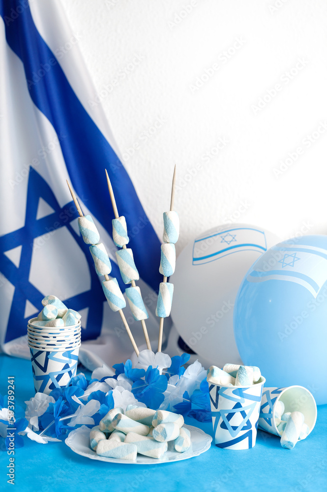 Birthday cake with candles in the form of the number 75 In blue and ...