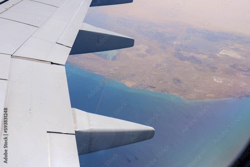 View from the window of a Flydubai plane flying over the territory of ...