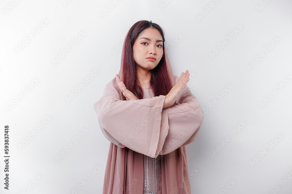 Beautiful Asian Muslim woman wearing a hijab with hand gesture pose ...