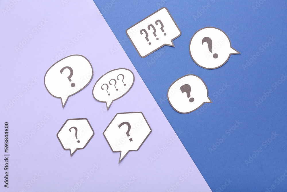Speech bubbles with question marks on color background Stock Photo ...