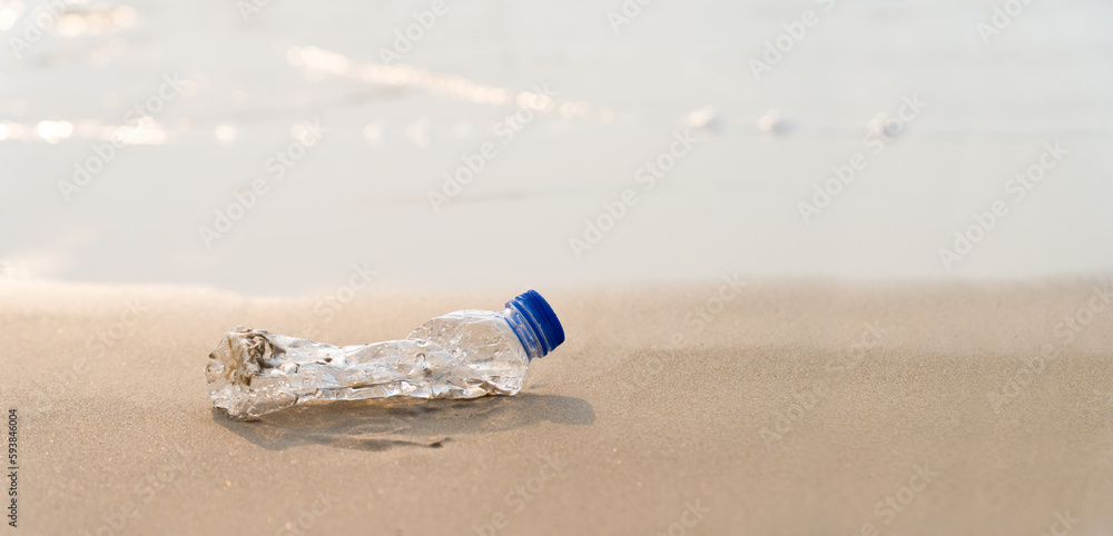garbage empty drinking water bottle plastic pollution on the sand sea ...