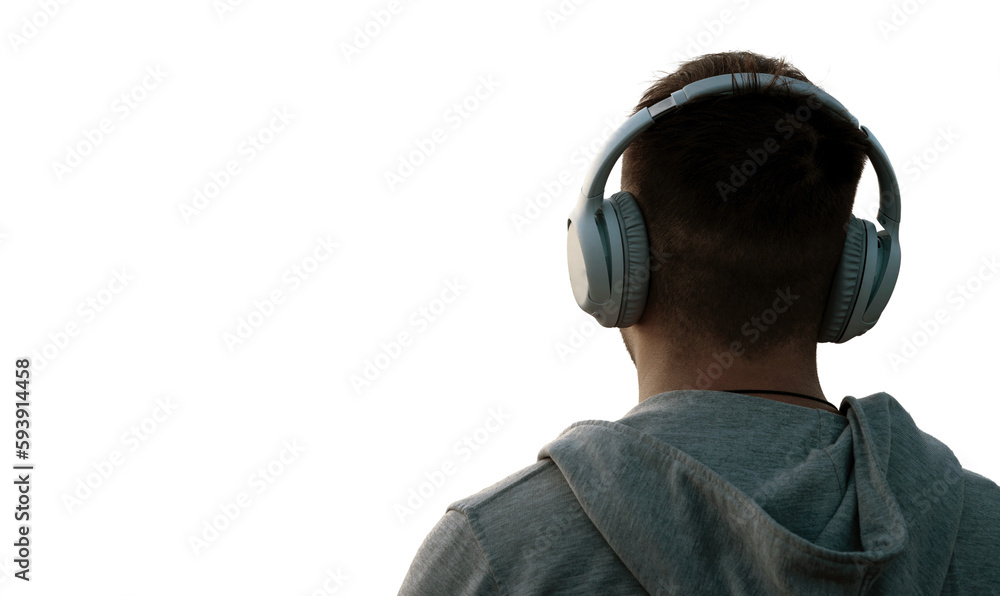 Rear view of a man listening to music with headphones in the back of ...