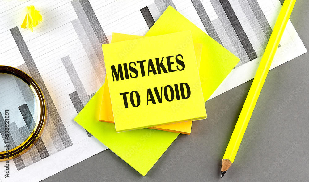 MISTAKES TO AVOID text on sticky on sticky on chart with pen Stock ...