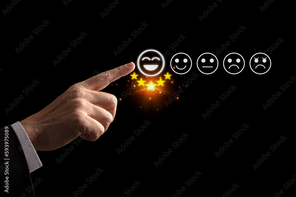 Man hand pressed the smile face emoticon on the virtual touch screen ...