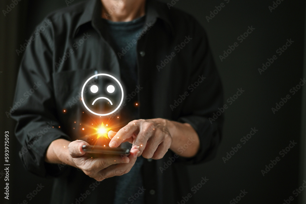 Unhappy Client hand pressed the unhappy face emoticon on the virtual ...