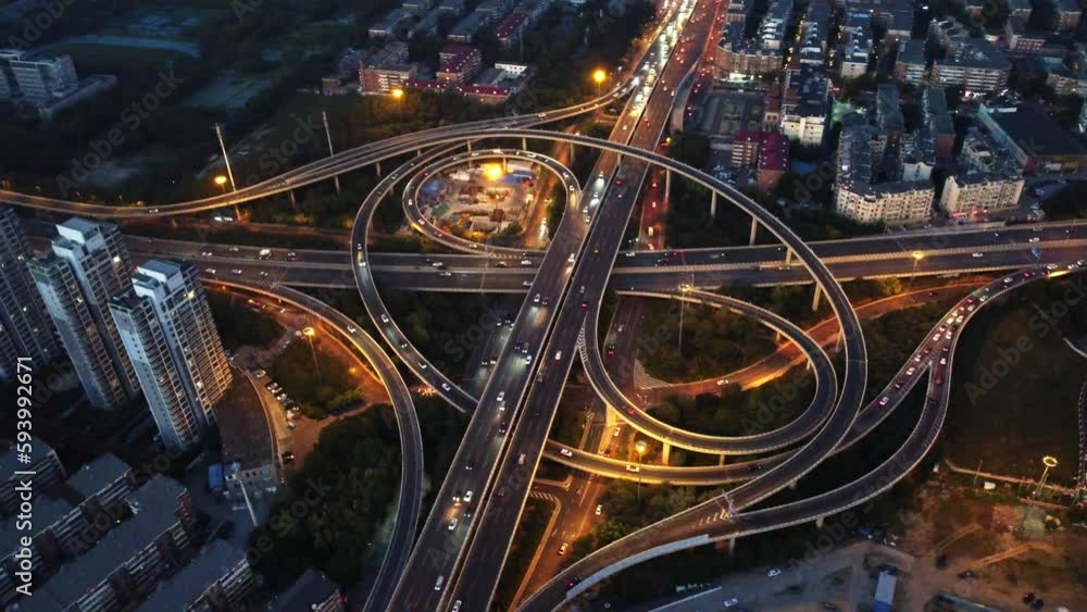 Aerial view of Moscow ring road with cars and buildings around it at ...