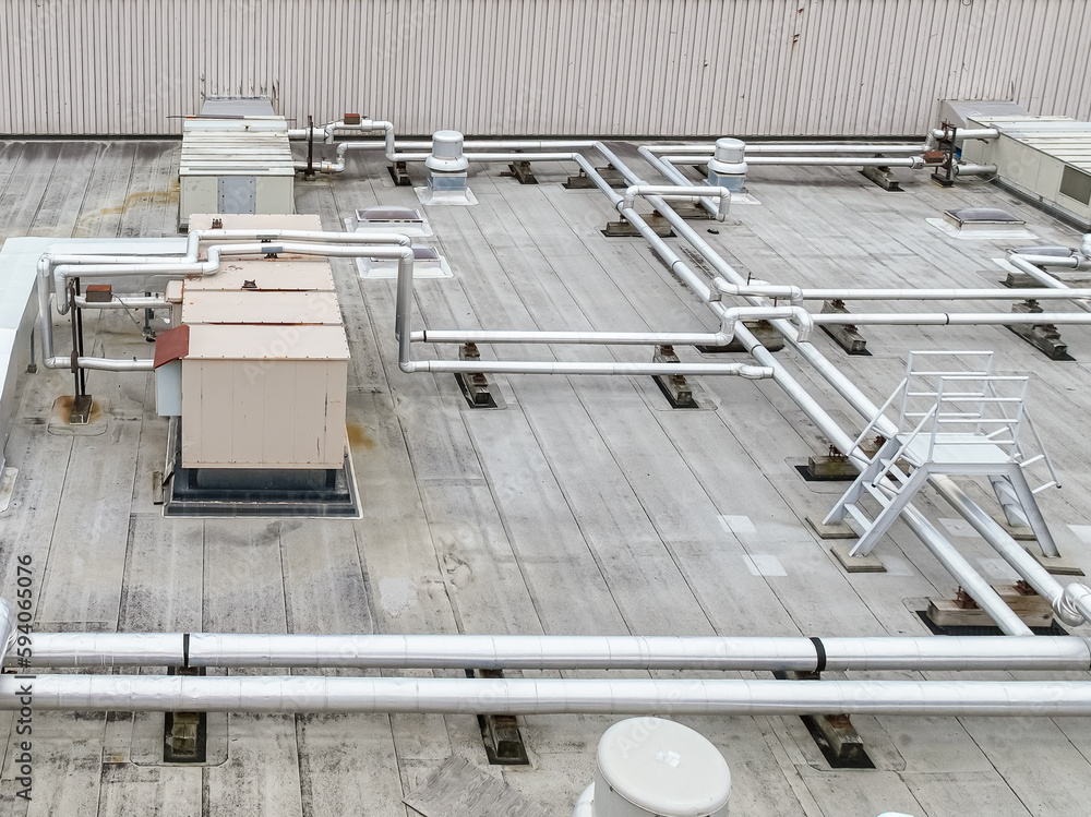 Aerial view of an Industrial looking HVAC equipment and pipes on gray ...