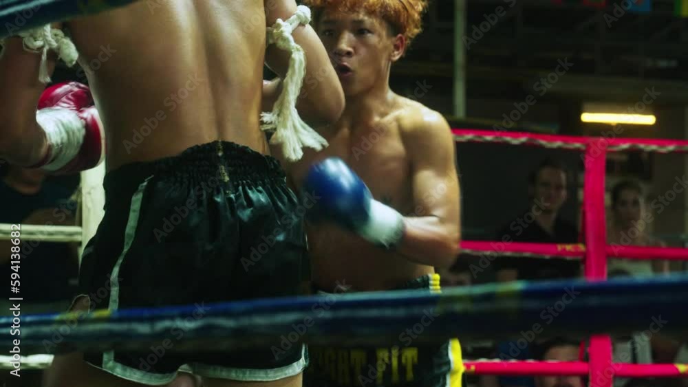 Video „4K Cinematic slow motion footage of two young Thai men fighters ...