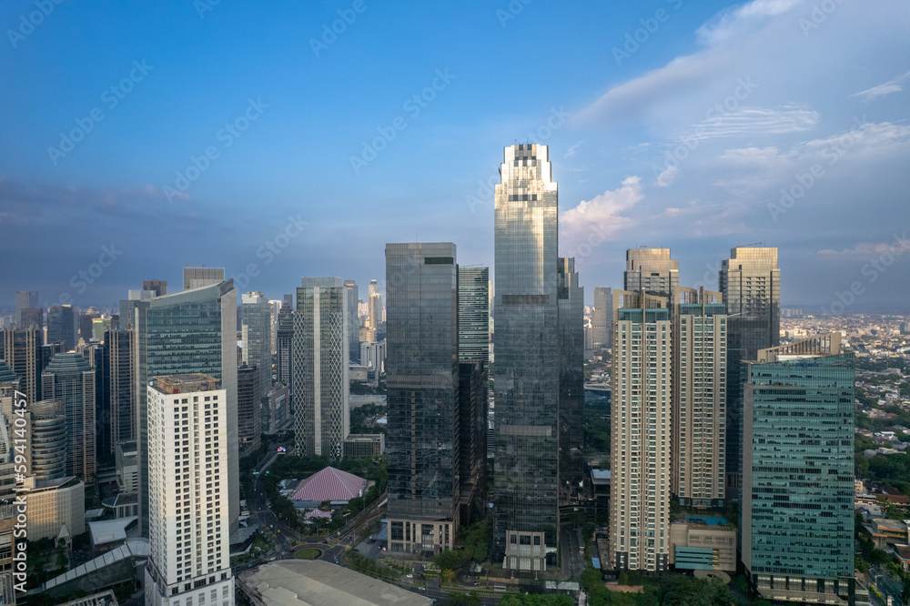 aerial shoot of Jakarta skyline during the golden hour. Jakarta is the ...