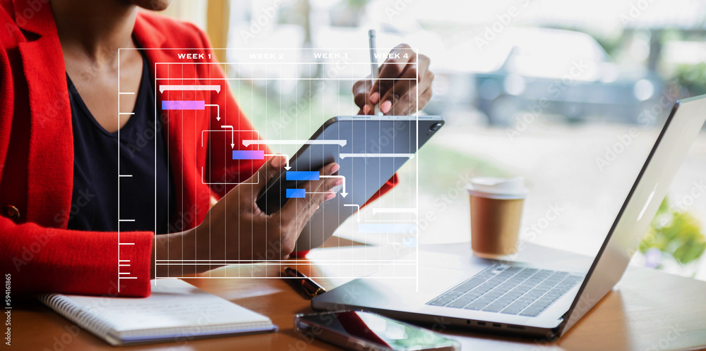 Project manager working and update tasks with milestones progress ...