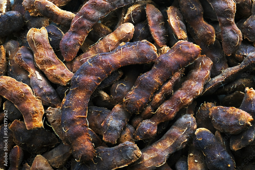 Organic tamarind peel, tamarind background, It is brown in color and ...