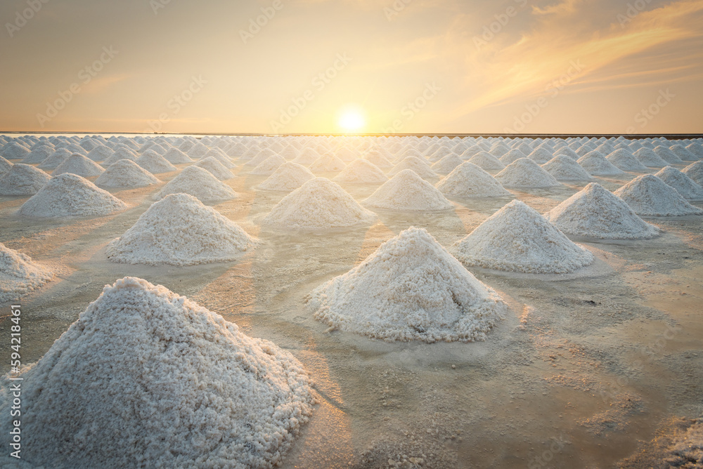 Foto de Sea salt pile pyramid ready for harvest in salt farm. Sea salt ...