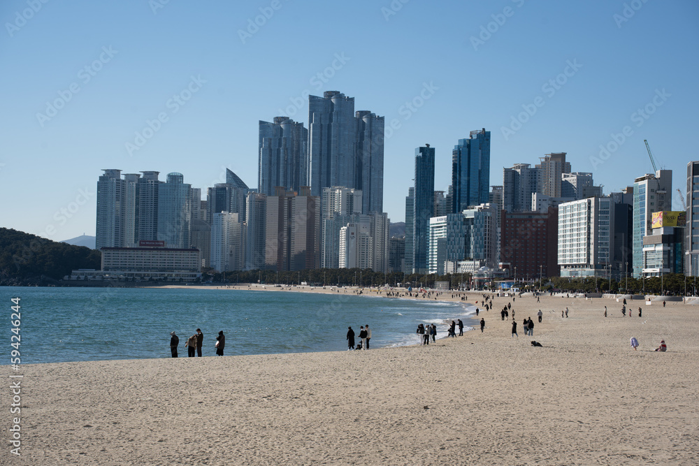 Busan Haeundae Beach, a beautiful white sandy beach with people are ...