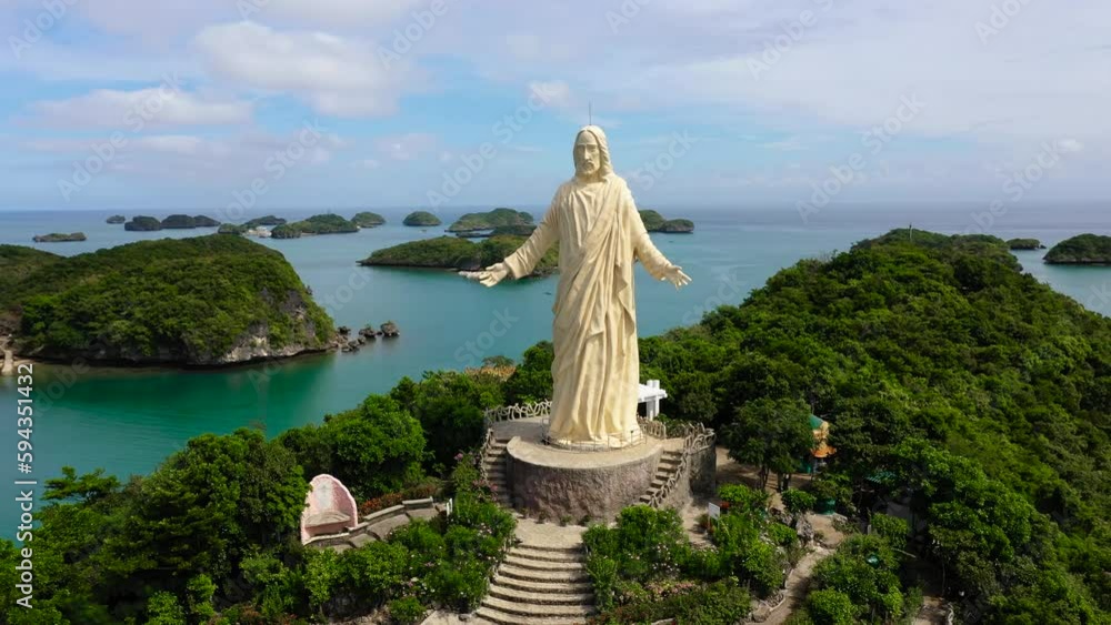 Aerial view of the hundred Islands national Park and the statue of ...
