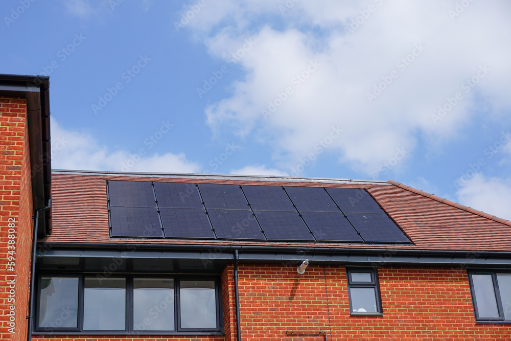 solar cell panels on rooftop of residential apartment block. eco energy ...