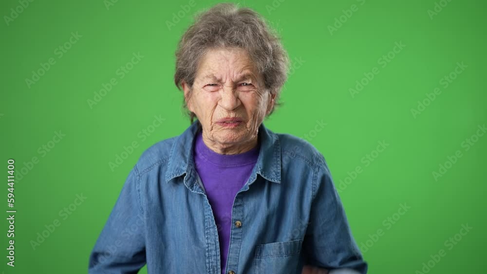 Displeased irritated frustrated sad angry elderly senior woman with ...
