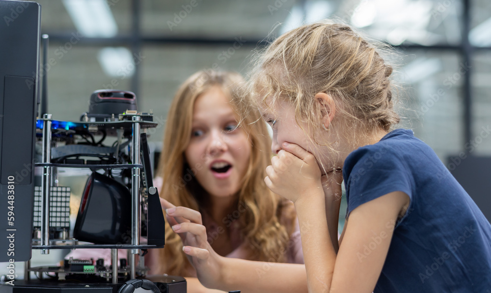 Group Kid teen child enjoy Machine Learning Robot arm is Moving Under ...