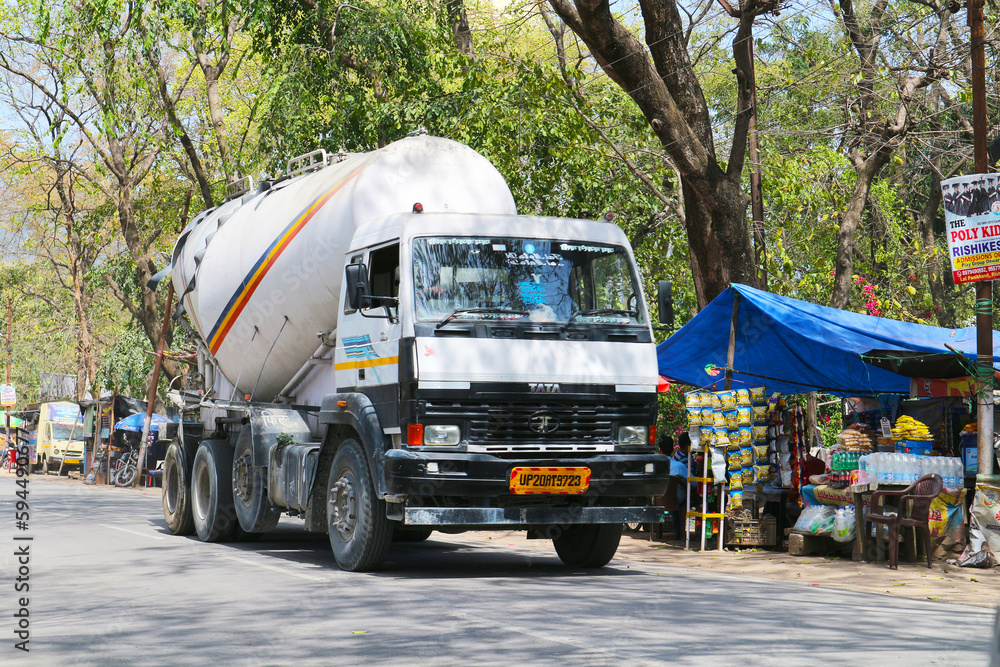 TATA cement truck driving on the road in Rishikesh, Uttarakhand, India ...