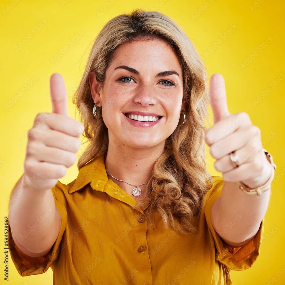 Portrait, thumbs up and motivation with a woman on a yellow background ...