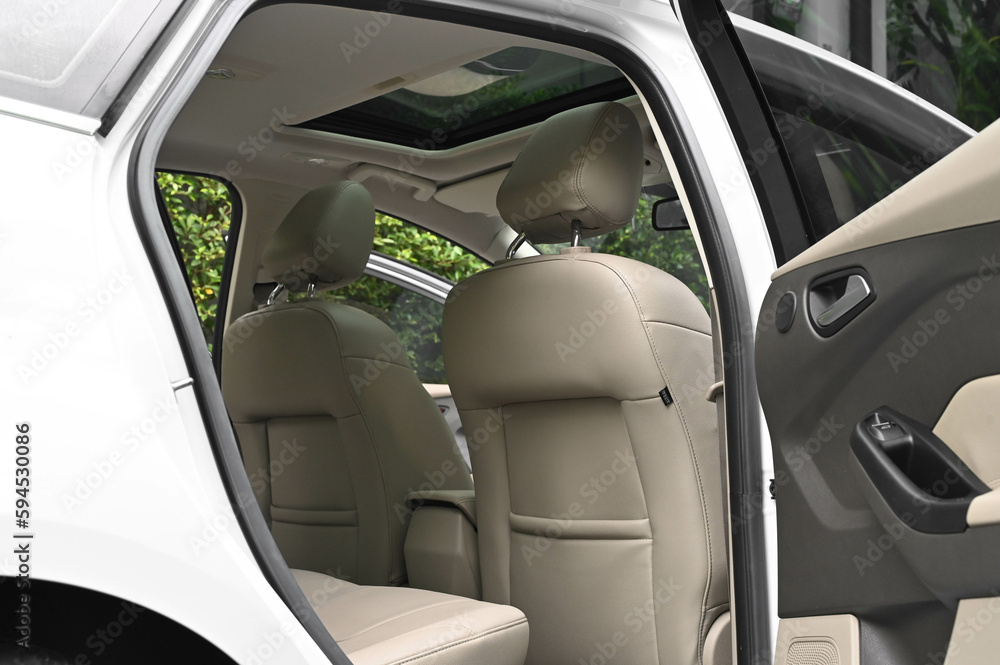 inside the back seat The passenger seat is wide and clean. Leather ...