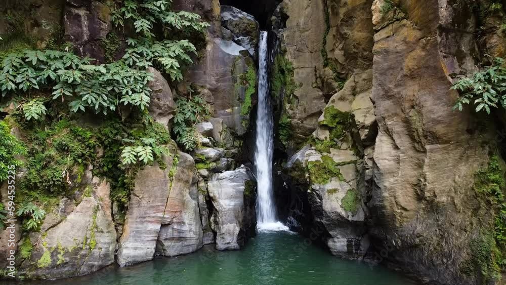Waterfall in Sao Miguel, Azores. Track of water fall amidst beautiful ...