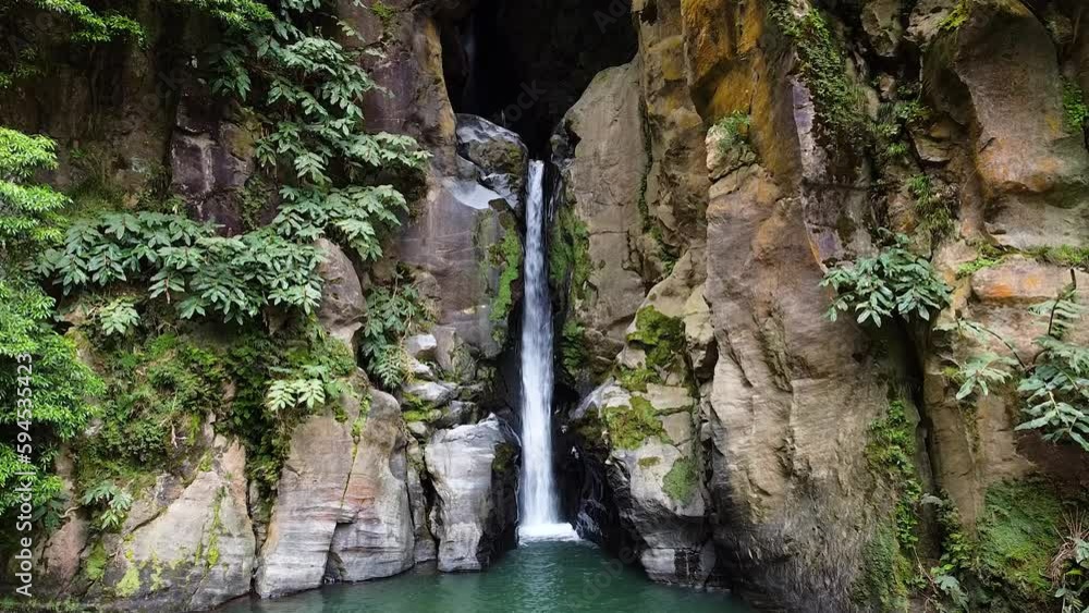 Waterfall in Sao Miguel, Azores. Track of water fall amidst beautiful ...