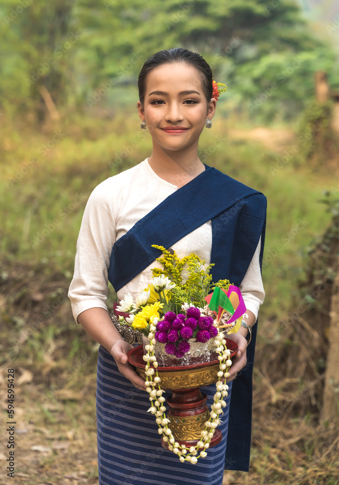 Beautiful young Thai girl in traditional northen Thai dress during ...