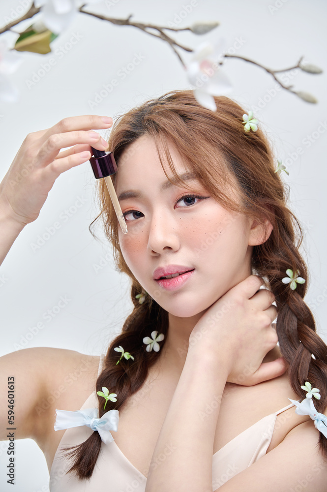 Beautiful Young Asian woman behind flower in beauty pose.Pretty girl in ...