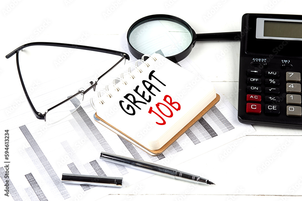 GREAT JOB text on notebook with calculator on diagram background Stock ...