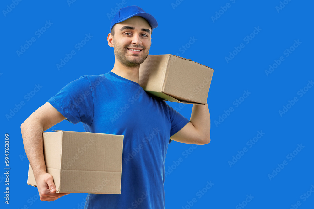 Delivery man with a box. Courier in uniform cap and t-shirt service ...