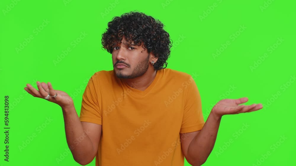 Knock-knock who is there. Confused indian man knocking door gesture ...