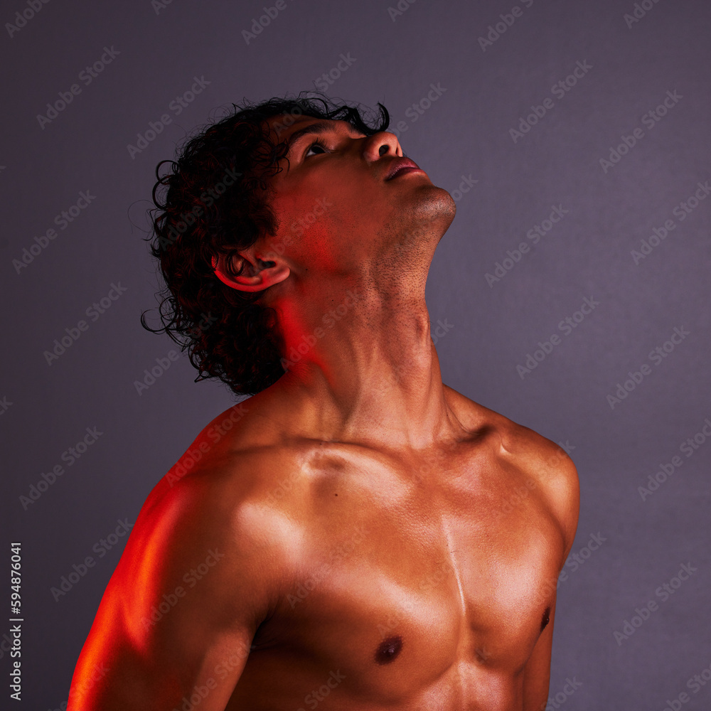 Body, beauty and man profile in a studio with art lighting and thinking ...