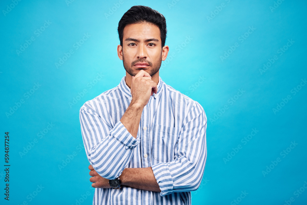 Portrait of man with focus, blue background and thinking of ideas with ...