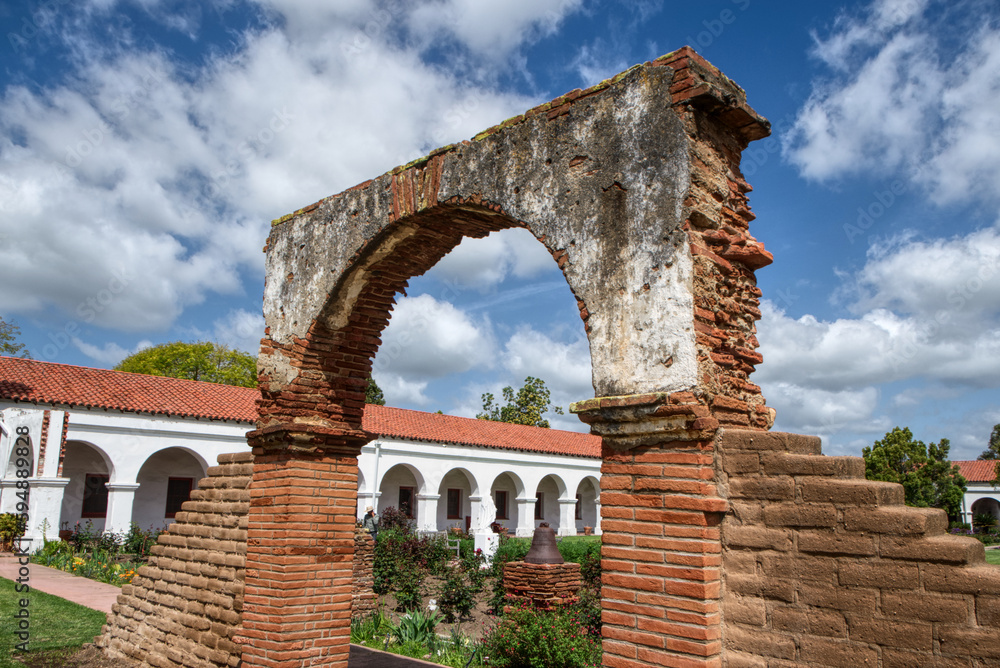 brick arch gate at historic California mission San Luis Rey in ...