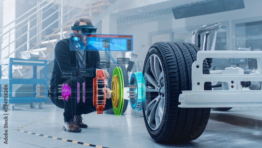 Automotive Engineer Working on Electric Car Chassis Platform, Using ...