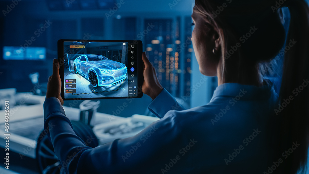 Automotive Engineer Working on Electric Car Chassis Platform, Using ...