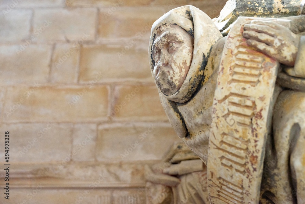 Bust of a woman, carved in the wall of the Cluney Abbey, located in ...