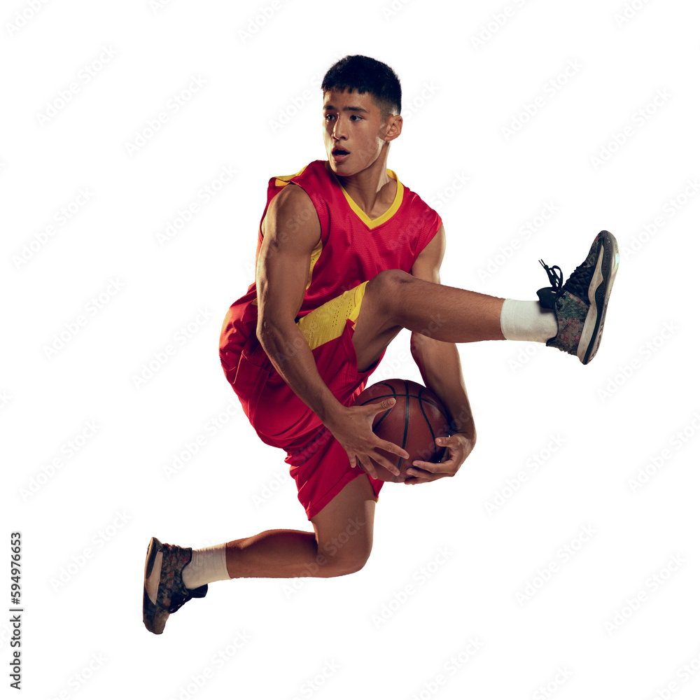 Young asian man, professional basketball player jumping with ball ...