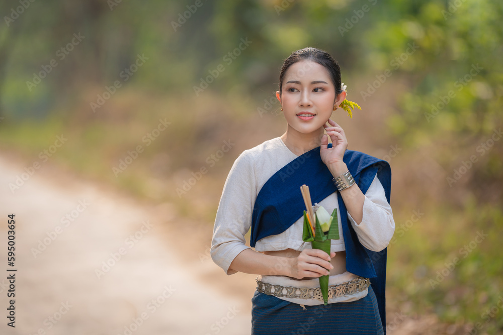 Beautiful Asian girl of rural villagers wearing the traditional ...