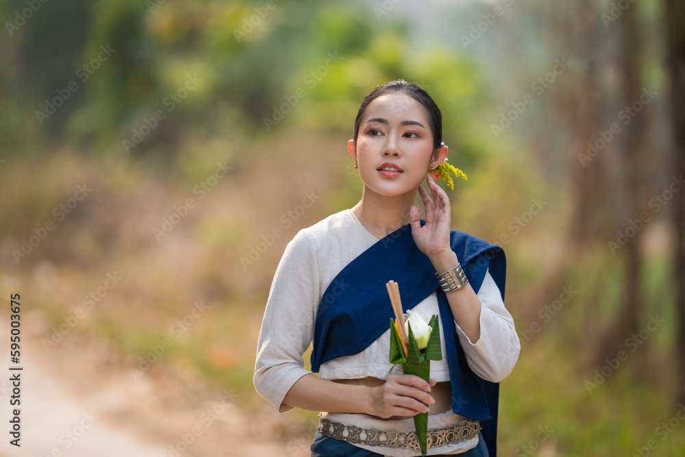 Beautiful Asian girl of rural villagers wearing the traditional ...
