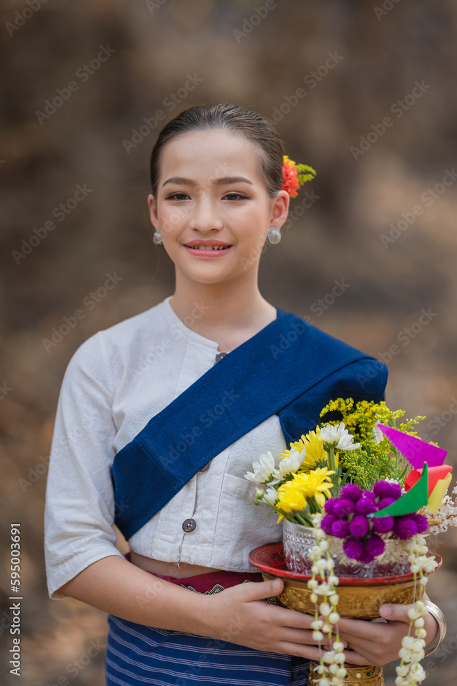 Beautiful Asian girl of rural villagers wearing the traditional ...