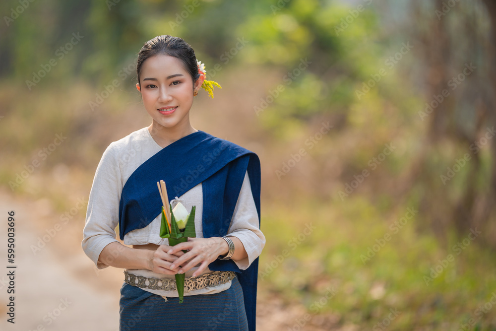 Poster Beautiful Asian girl of rural villagers wearing the traditional ...